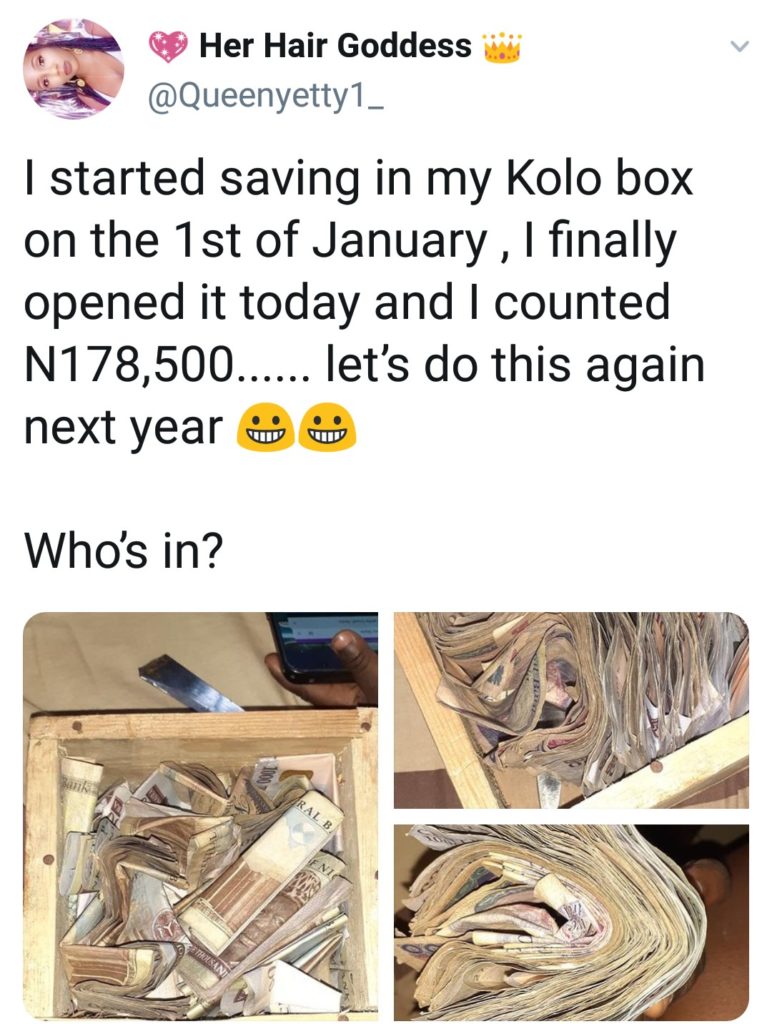 Nigerian Lady shows off N178k she saved in a wooden Saving Box