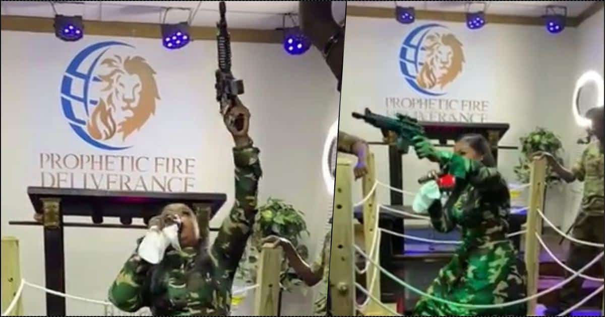 Drama as prophetess wields gun while praying in tongues (Video)