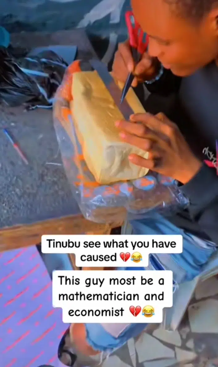 Man uses ruler and pen to measure bread, cuts it into 3 parts