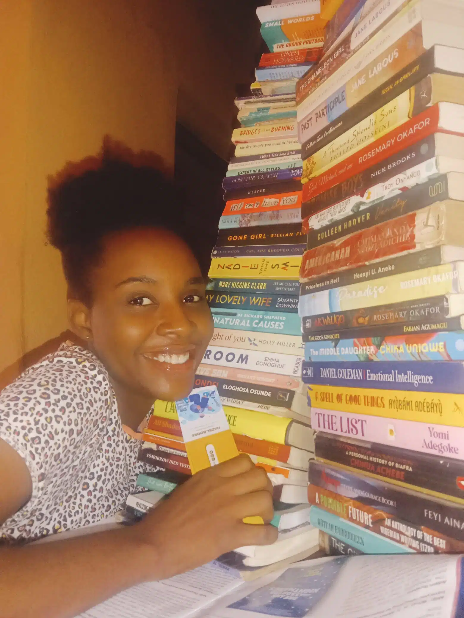 Lady flaunts gigantic stacks of books she read in 2023