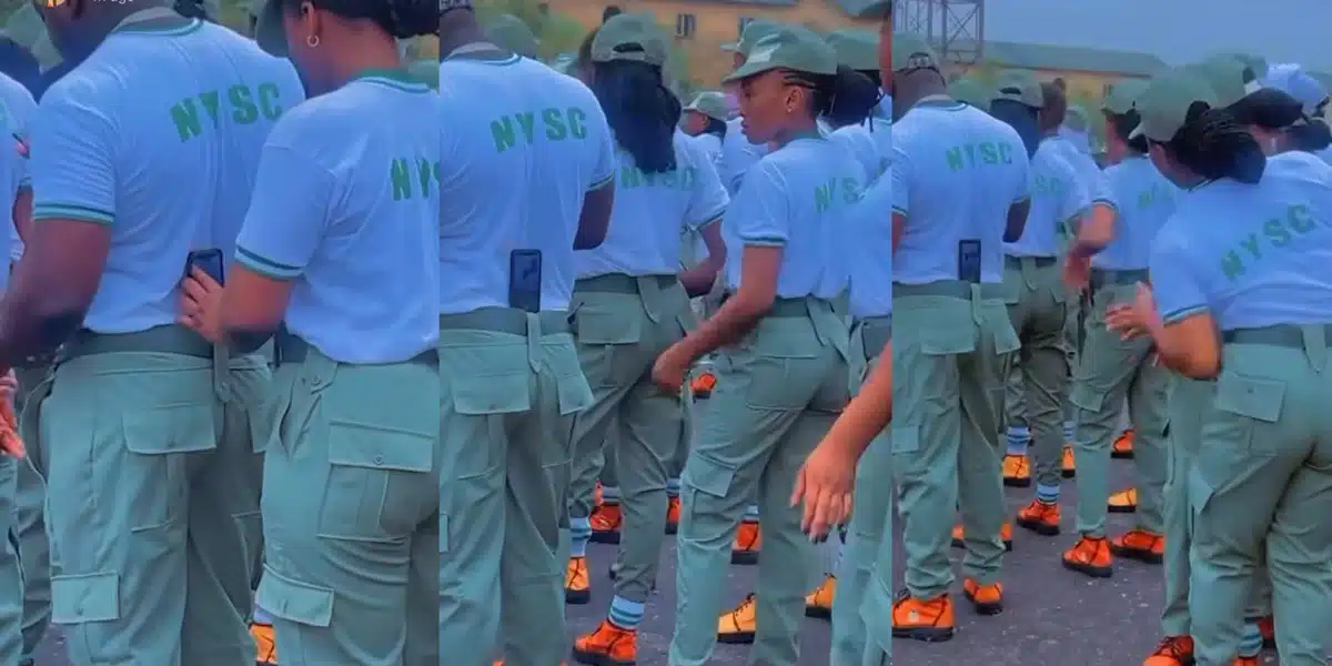 Female NYSC Corpers use male corper as makeshift tripod stand