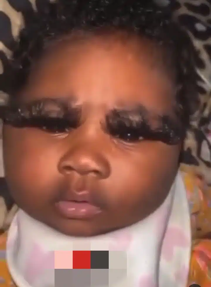 Slay mom applies eyelash extensions on baby girl