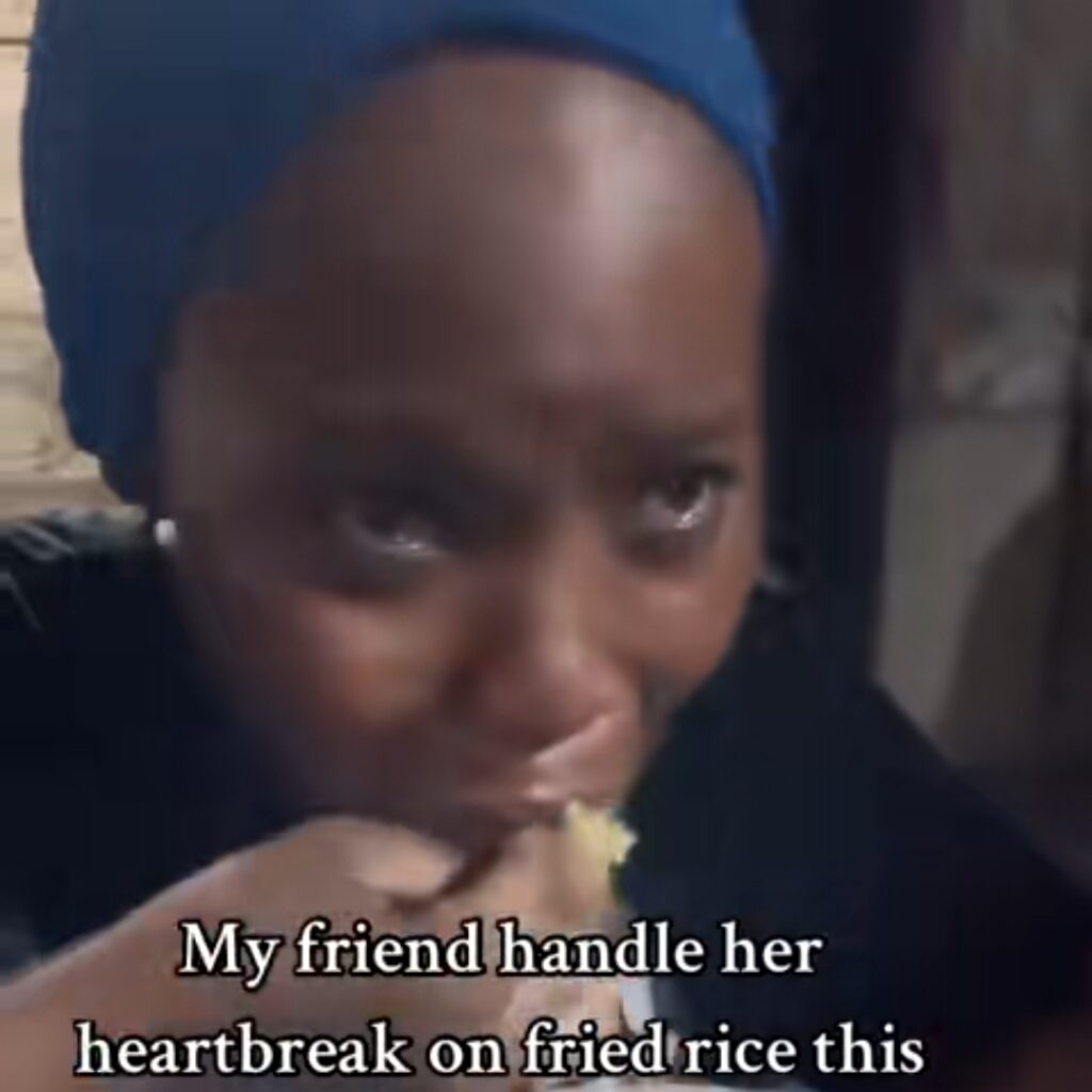 Lady feeds herself rice while crying as boyfriend ends 3-year relationship