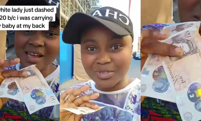 Nigerian woman in UK gets £20 from oyibo lady for backing baby
