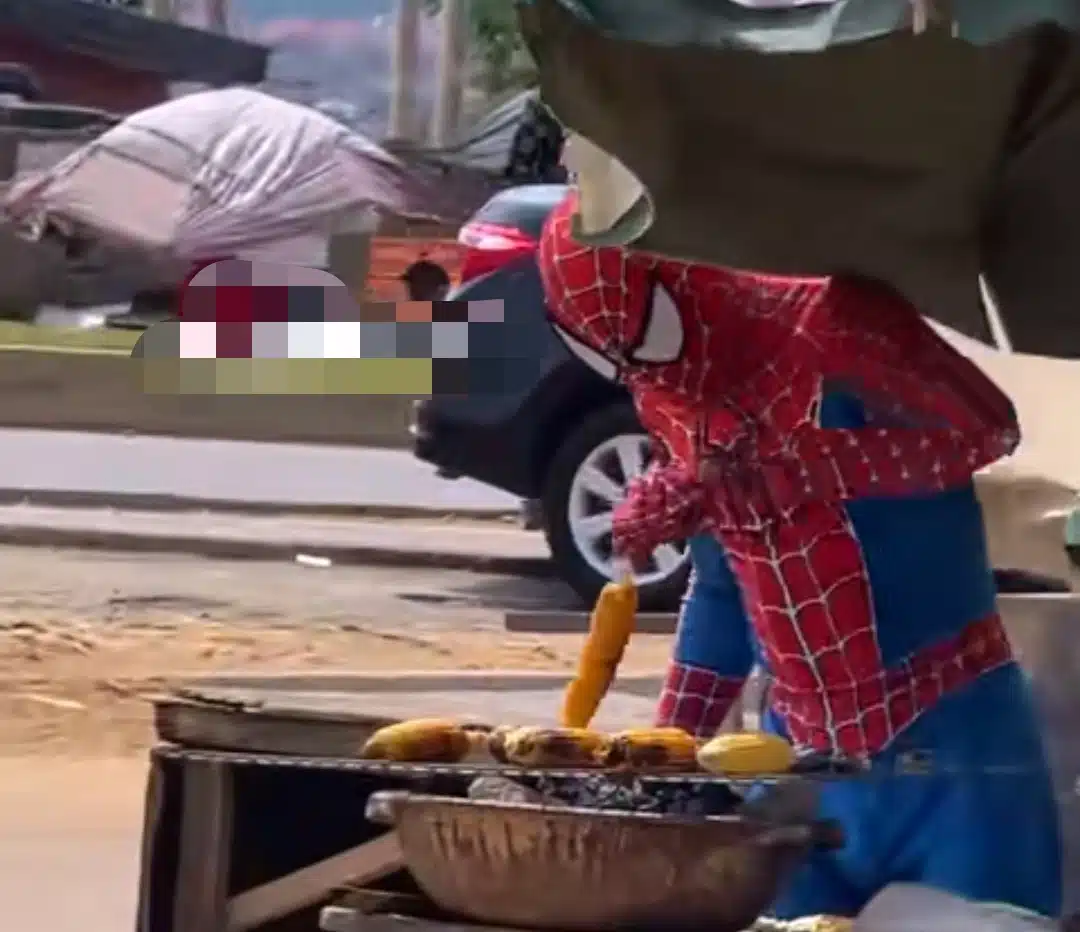 Nigerian Spider-Man sells roasted corn as his side hustle
