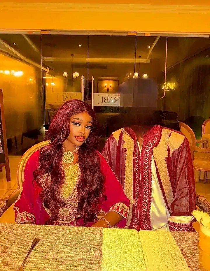 Lady hides her man's face while sharing cute photos