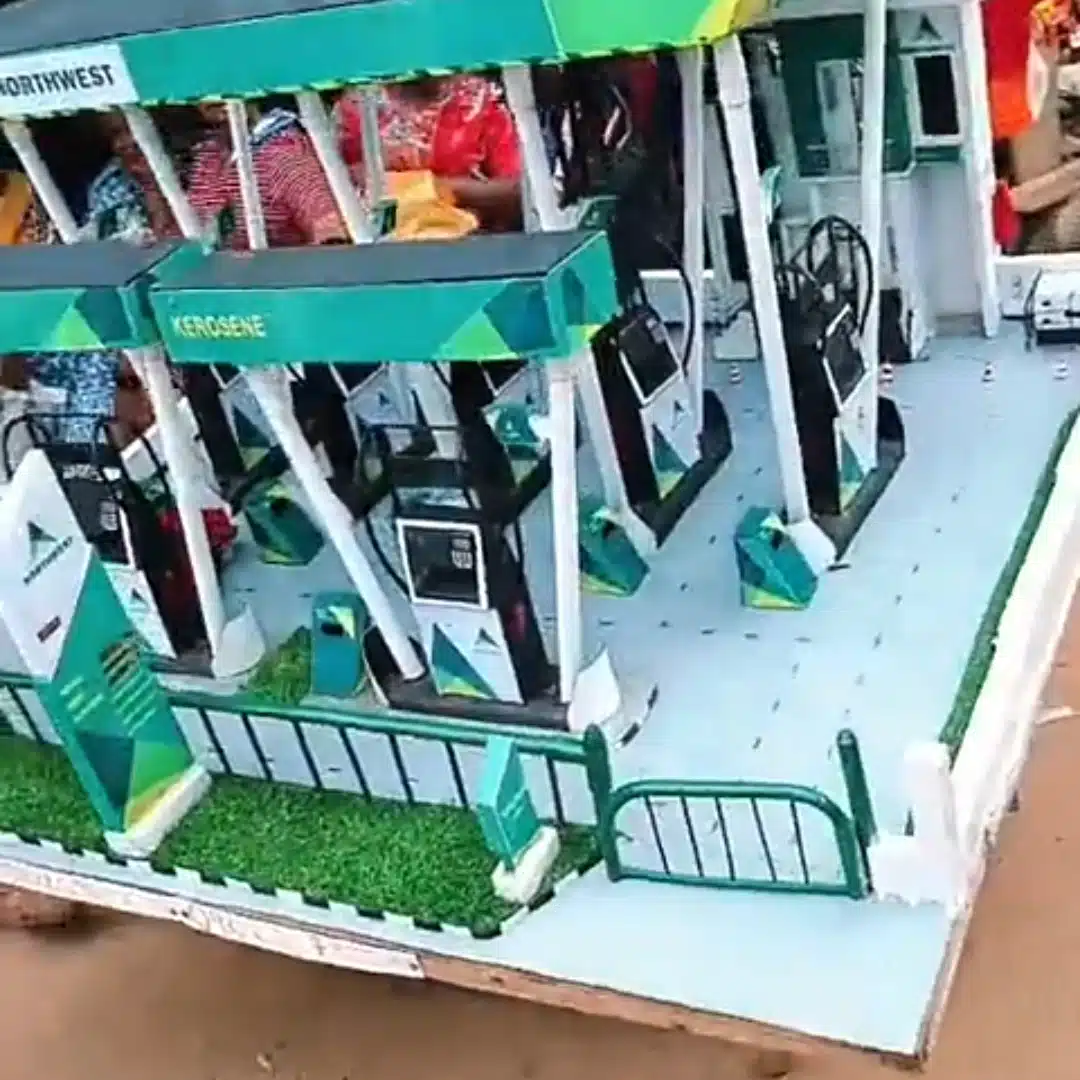 Man builds filling station from scratch using carton and hose