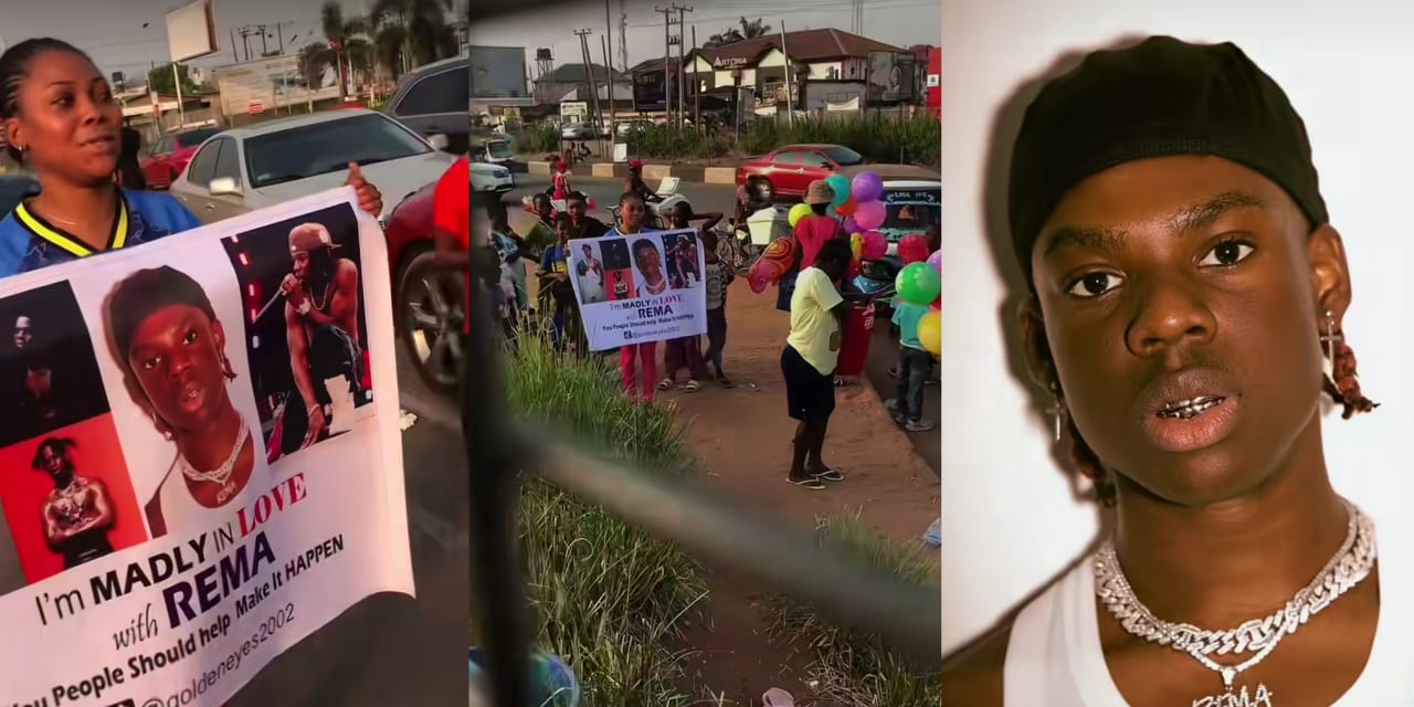 Lady trends for carrying banner of Rema on the street to prove her love